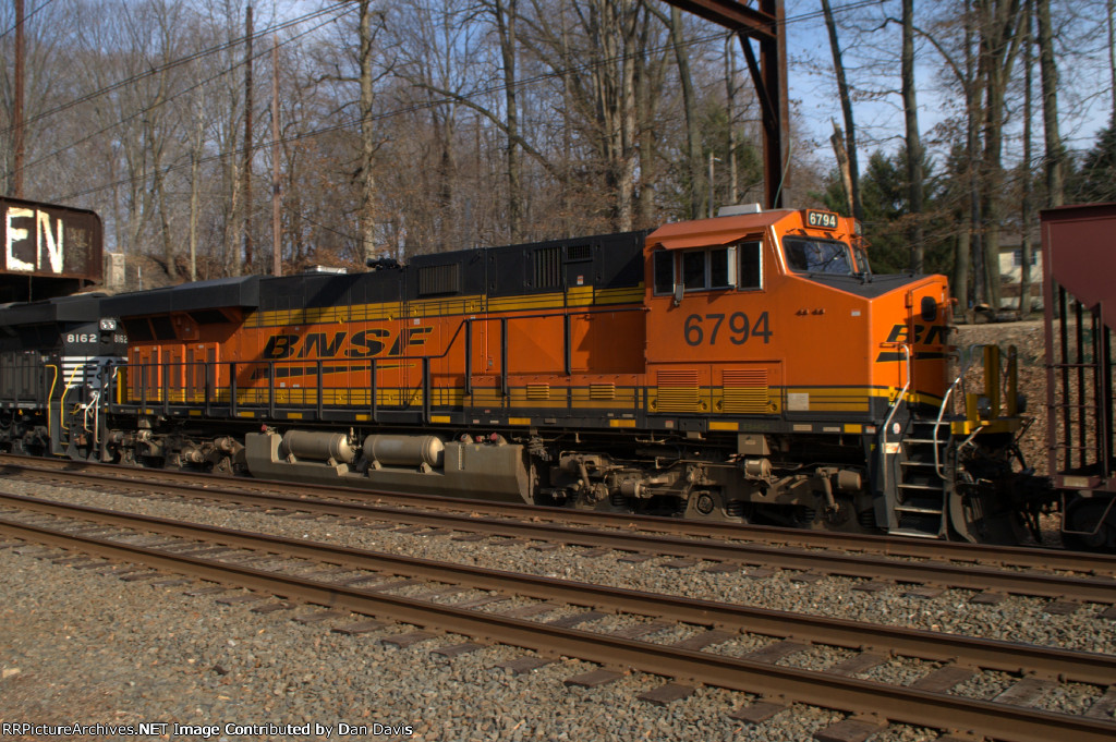 BNSF ES44C4 6794 trails on K043-22